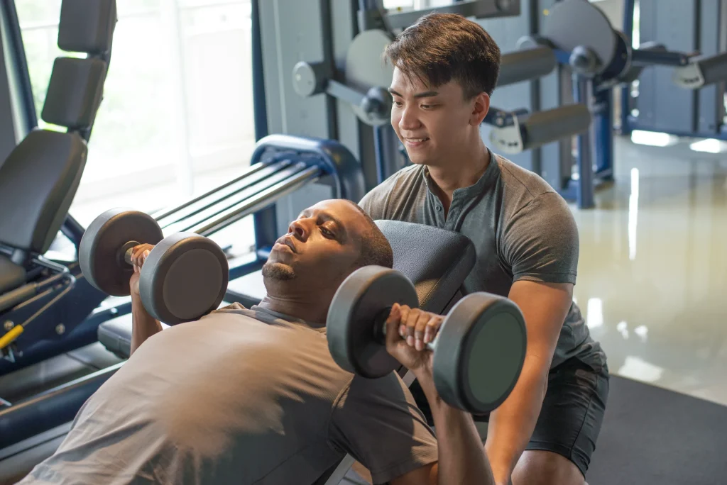 The Benefits of a Spotting Partner - Body Muscle Matters